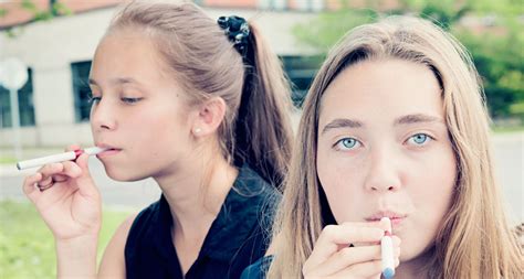 High School Girls Smoking Cigarettes