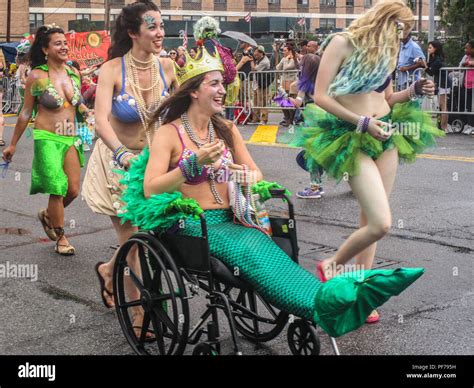 Participants In The 33rd Annual Mermaid Parade At New Yorks Coney