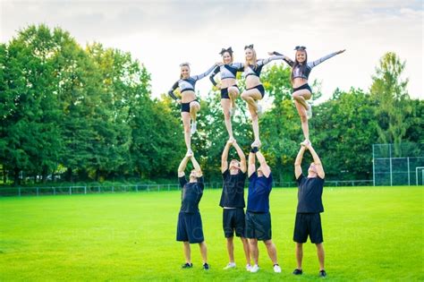 Football Spieler Und Cheerleaderin 20130811 Cheer 1386 Cinestock Lizenzfreie Cinemagraphs