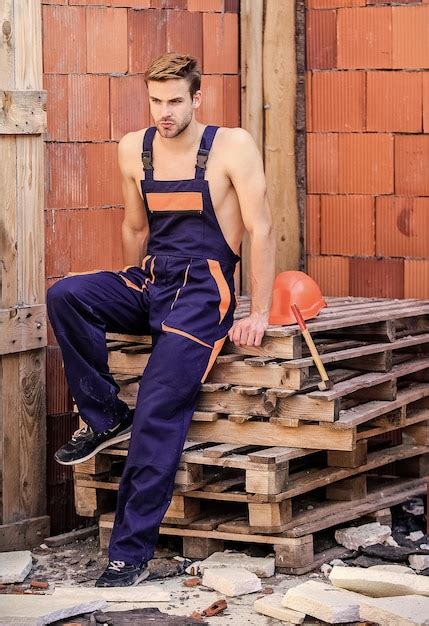 Premium Photo Sexy Laborer Building Construction Worker Brick Wall