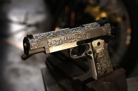 See Brad Pitt And Angelina Jolies Custom Guns Created By Jesse James