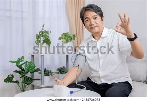 Old Man Checking Blood Pressure Home Smiling Photos Images Pictures Shutterstock