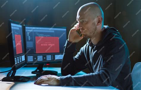 Premium Photo Hacker With No Access On Computer Calls On Cell