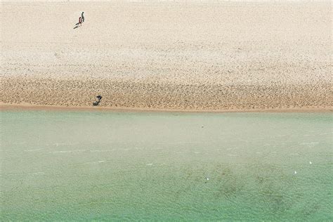 Aerial View Of Three Holiday Makers Strolling On Beach Melbourne