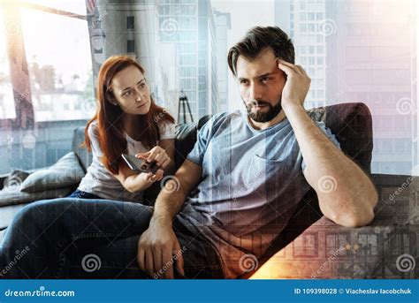 Jealous Woman Showing Her Boyfriend Compromising Material In His Phone