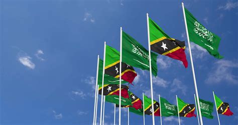 Santo Kitts E Nevis E Ksa Reino Do Saudita Arábia Bandeiras Acenando Juntos Dentro A Céu