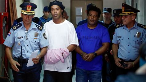 Handcuffed Ronaldinho And Brother Appear In Paraguayan Court