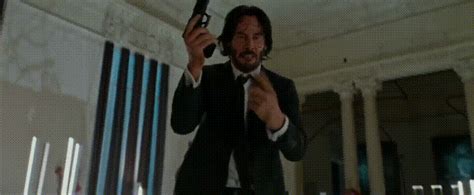 john wick reloading a pistol on imgur