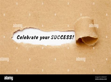 Handwritten Text Celebrate Your Success Appearing Behind Torn Brown Paper Concept About Success