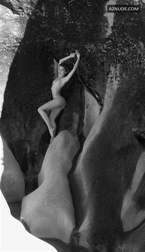 chiara bianchino poses fully naked on a cliff in a new photoshoot by