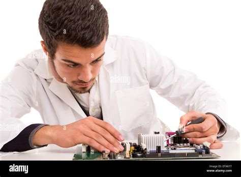 a computer engineer or technician working on a computer motherboard