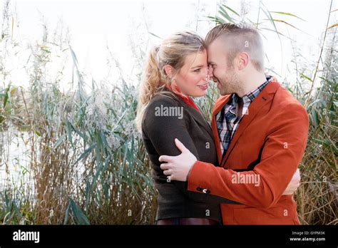Lovers in the cold wind Stock Photo - Alamy