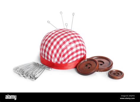 Pincushion Sewing Needles Safety Pins And Buttons Isolated On White