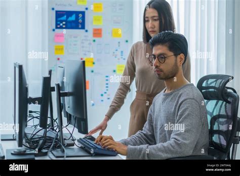 asian and indian developer team discussion feedback analysis coding