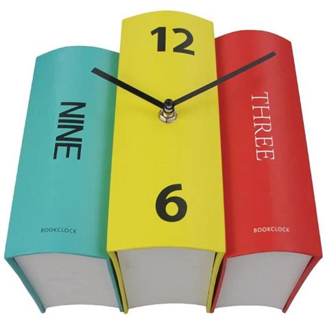 A Clock Made Out Of Three Books With Numbers On Each Side And The Number Six