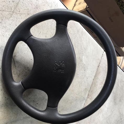 خرید و قیمت غربیلک فرمان پژو پارس طرح قدیم مشکی خاکستری اصلی از غرفه