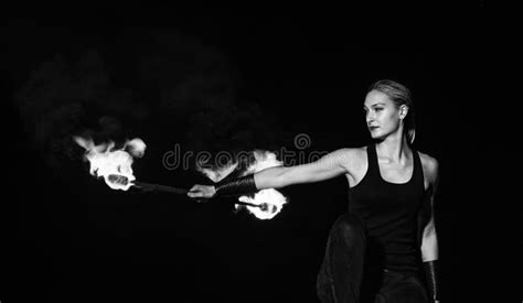 Amusement And Entertainment Sensual Girl Twirl Burning Baton In