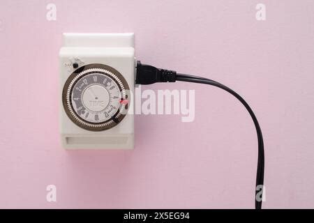 Electrical Outlet Timer And Power Cord Stock Photo Alamy