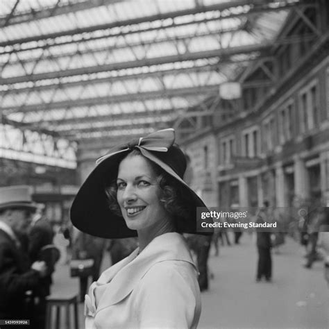 A Woman Named As Mrs Joseph Mattei Poses In A Hat Adorned With A Bow