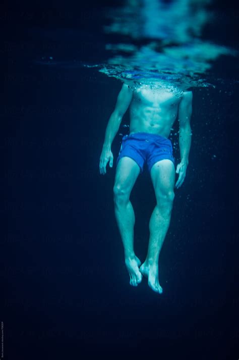 Babe Muscular Man Floating In The Sea By Stocksy Contributor Boris Jovanovic Stocksy