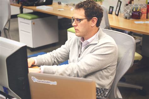 gray person laptop adult employee coder programmer programming