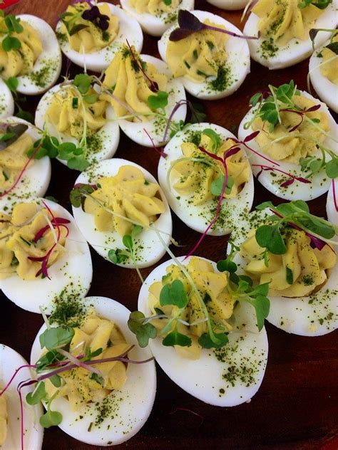 Deviled Eggs With Cheese And Garnish Hamptons Aristocrat