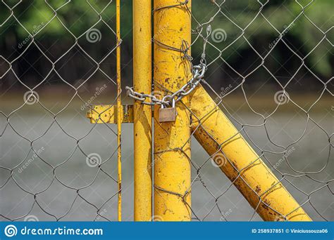 Metal Gate Locked With Chain And Padlock Stock Image Image Of Mesh Cage