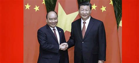 习近平会见越南总理 八一视频·中国军网