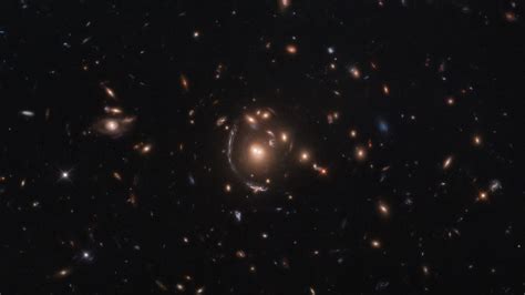 Massive Clusters Gravity Magnifies Light From Extremely Distant Star