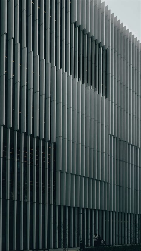 A Tall Building With Many Vertical Lines On It Photo Free Lisbon
