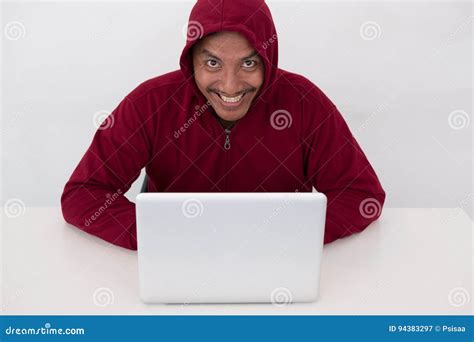 A Young Computer Geek Working Online Hacker Wearing A Hooded To Stock Image Image Of Notebook