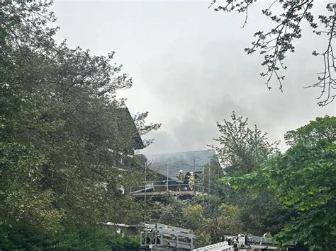 Firefighters Tackle Blaze For Hours After Flames Rip Through Building