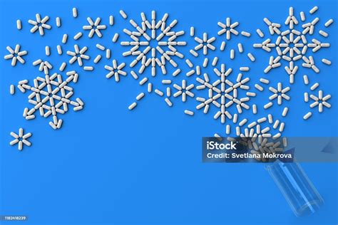 눈송이와 숫자 2020의 형태로 파란색 배경에 흩어져 있는 많은 알약 3d 일러스트레이션 2020년에 대한 스톡 사진 및 기타 이미지 2020년 개념 건강관리와 의술