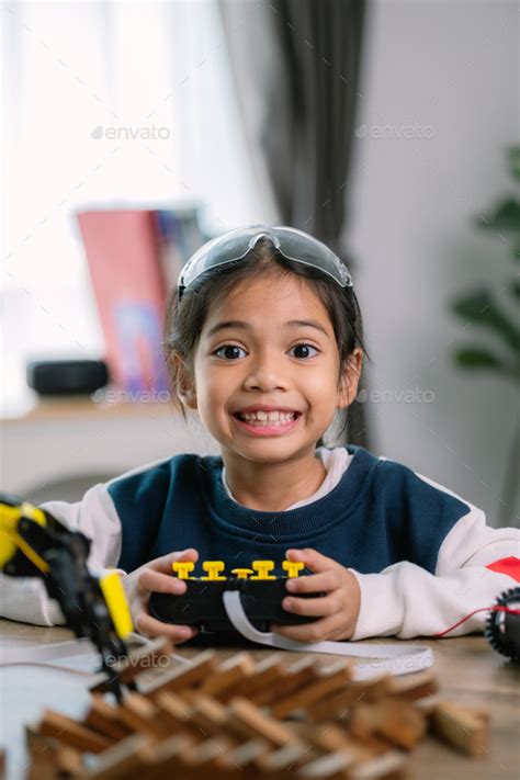 Asian Girls Were Learning Robot Programming And Getting Lessons Control