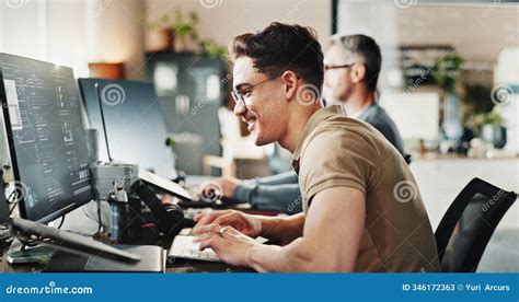 Computer Typing And Web Development With Happy Man In Creative Workplace For Coding Or Design