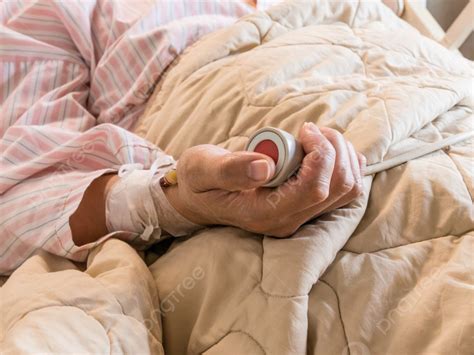 Woman Pushing Emergency Button In Hospital Bed Photo Background And Picture For Free Download