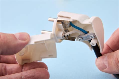 Premium Photo An Electrician Connected An Electrical Cord To
