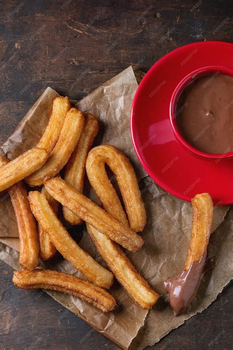 Churros Españoles Tradicionales Con Chocolate Foto Premium
