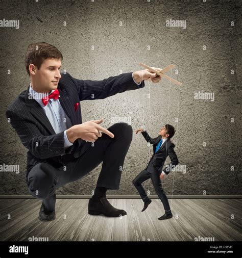 Puppeteer And Puppet Business Stock Photo Alamy
