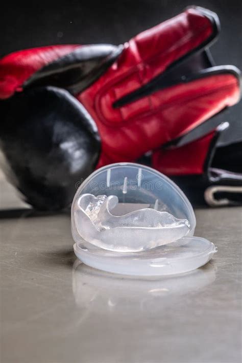 Boxer Teeth Protection and Pair of Boxing Gloves Stock Photo - Image of ...