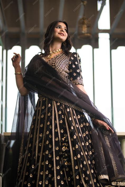 Premium Photo A Beautiful Stylish Girl In A Black Dress A Model In A