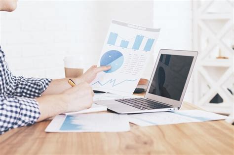 premium photo man analyzing business report