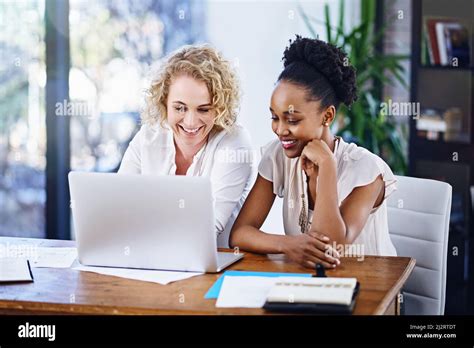 merging their creative flair to accomplish the task at hand cropped