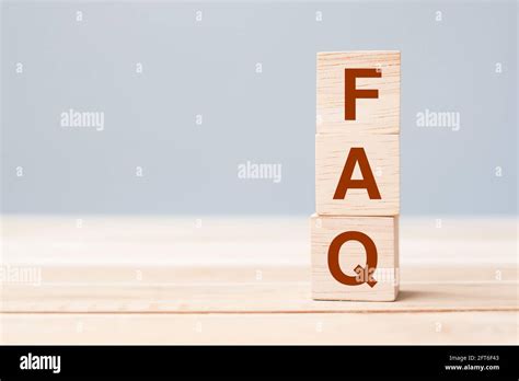 Wooden Cube Blocks With Faq Text Frequently Asked Questions On Table Background Financial