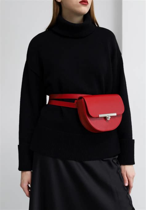 Жіноча шкіряна сумка поясна кросбоді Bridget червона Tw Bridget Red Купити Wings