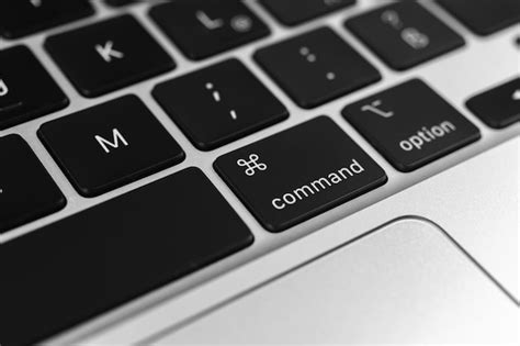 Premium Photo Command Key And Button On Apple Keyboard Command Sign Close Up Modern Laptop