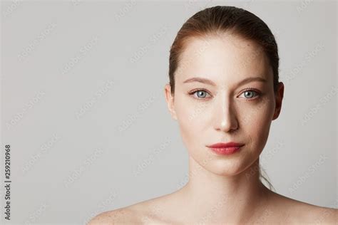 Beauty Portrait Of A Pretty Young Topless Redhead Girl With Freckles