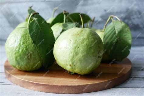 Premium Photo Close Up Of Slice Of Guava On Table