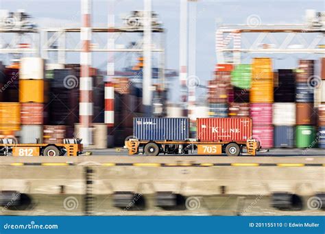 Agv Automated Guided Vehicle On Quay Alongside A Ship In The Port Of Rotterdam Editorial Photo