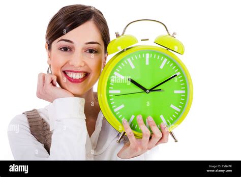 Attractive Young Model Smiling And Holding The Clock On White